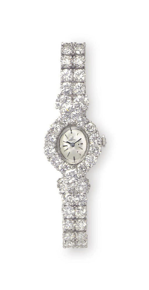 A DIAMOND WRISTWATCH, BY OMEGA