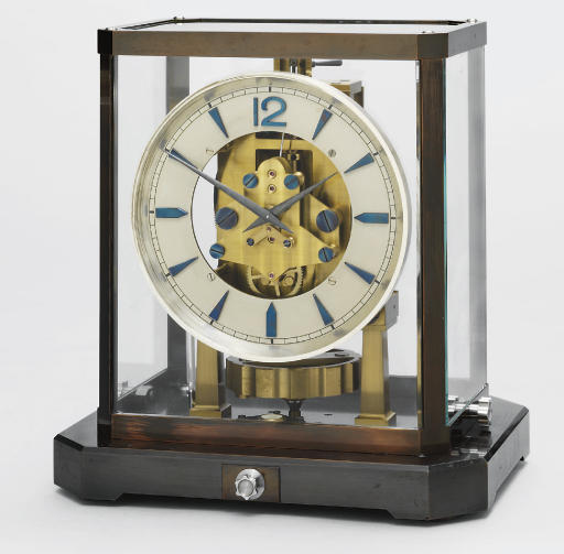 A French large gilt-brass striking eight day four-glass mantel clock ...