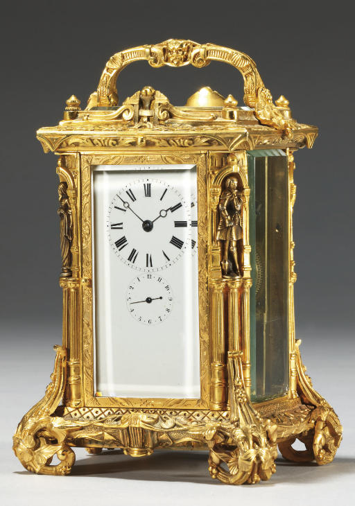 A French large gilt-brass striking eight day four-glass mantel clock ...