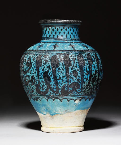 A RAQQA TURQUOISE GLAZED POTTERY VASE , SYRIA, FIRST HALF 13TH CENTURY ...