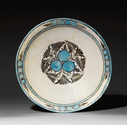 A TIMURID BLUE, WHITE AND TURQUOISE GLAZED POTTERY DISH , CENTRAL ASIA ...