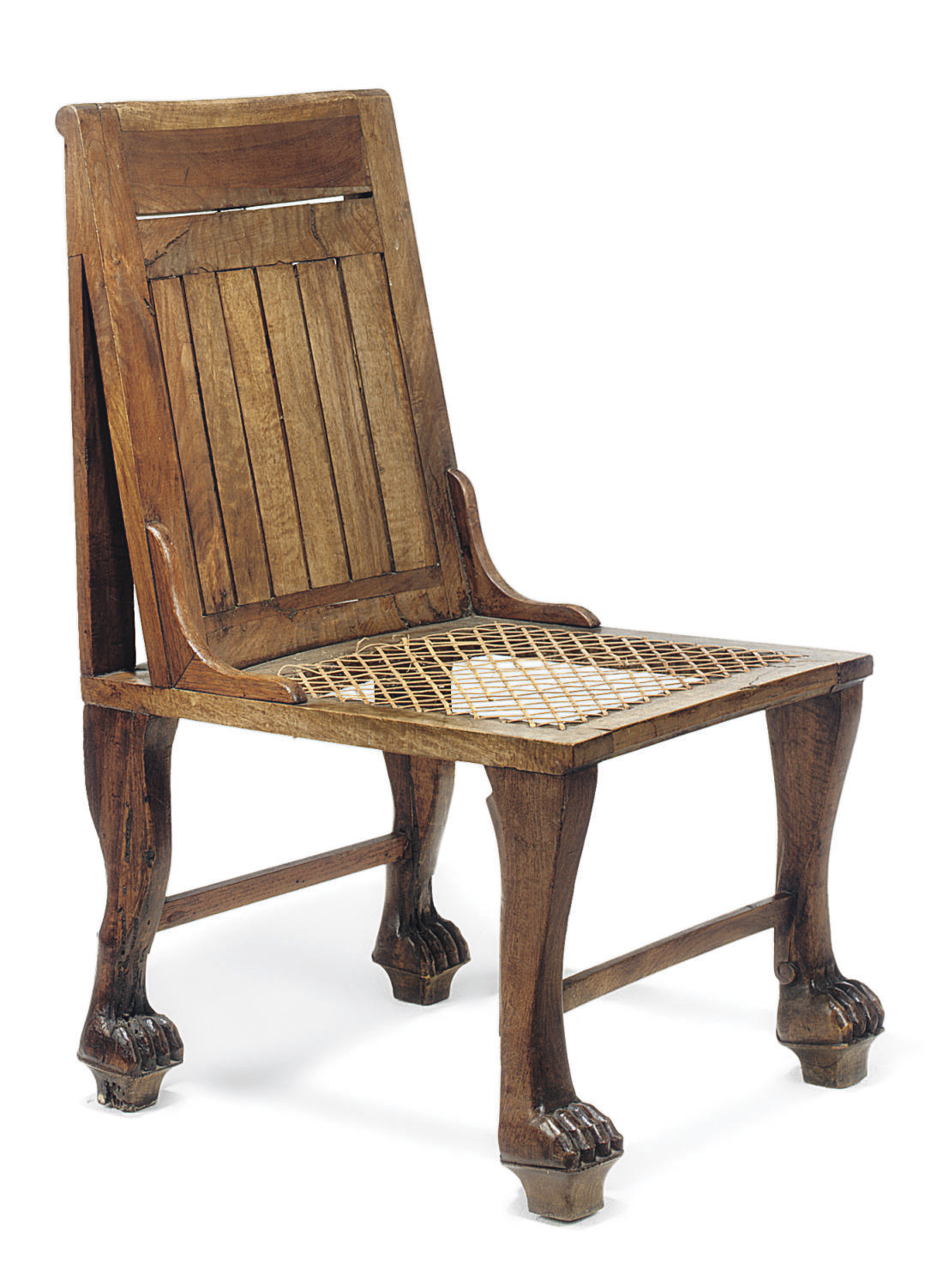 AN EGYPTIAN REVIVAL WALNUT SIDE CHAIR , CIRCA 1905 | Christie's