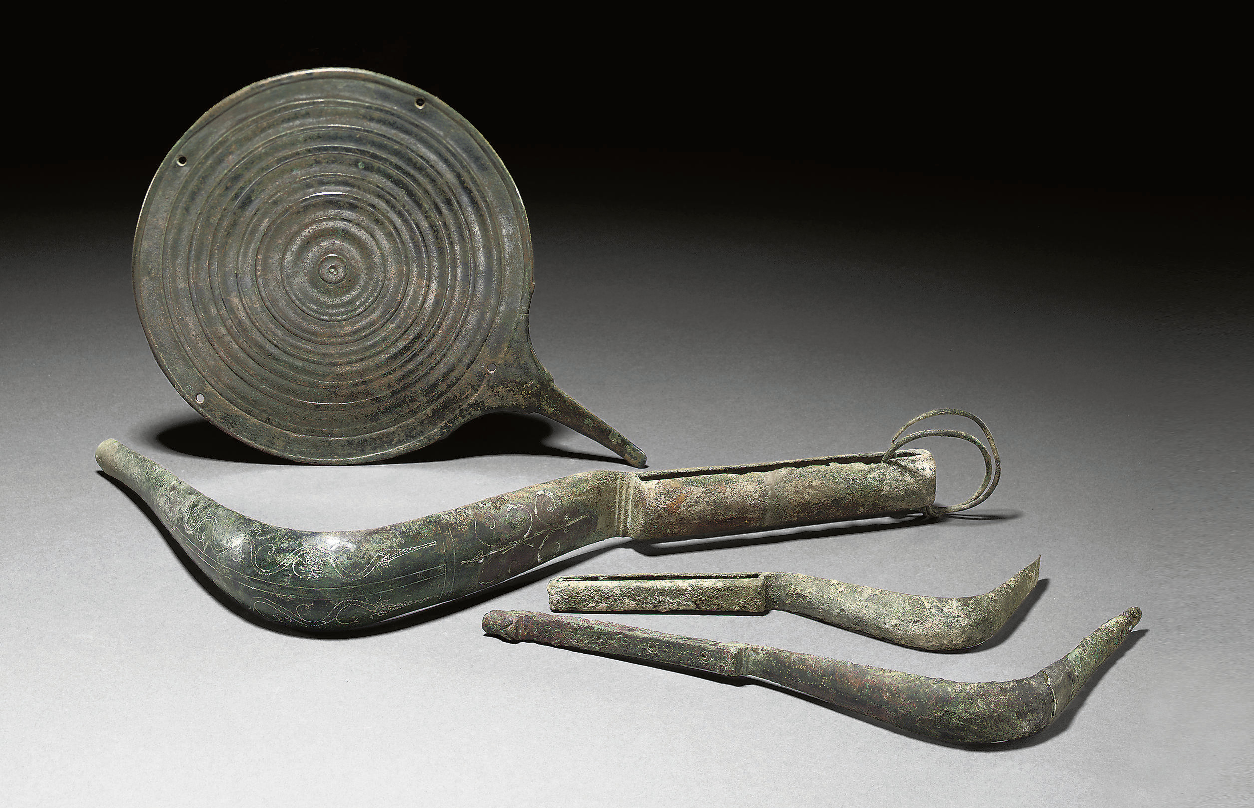A ROMAN BRONZE STRIGIL , CIRCA 1ST-2ND CENTURY A.D. | Christie's