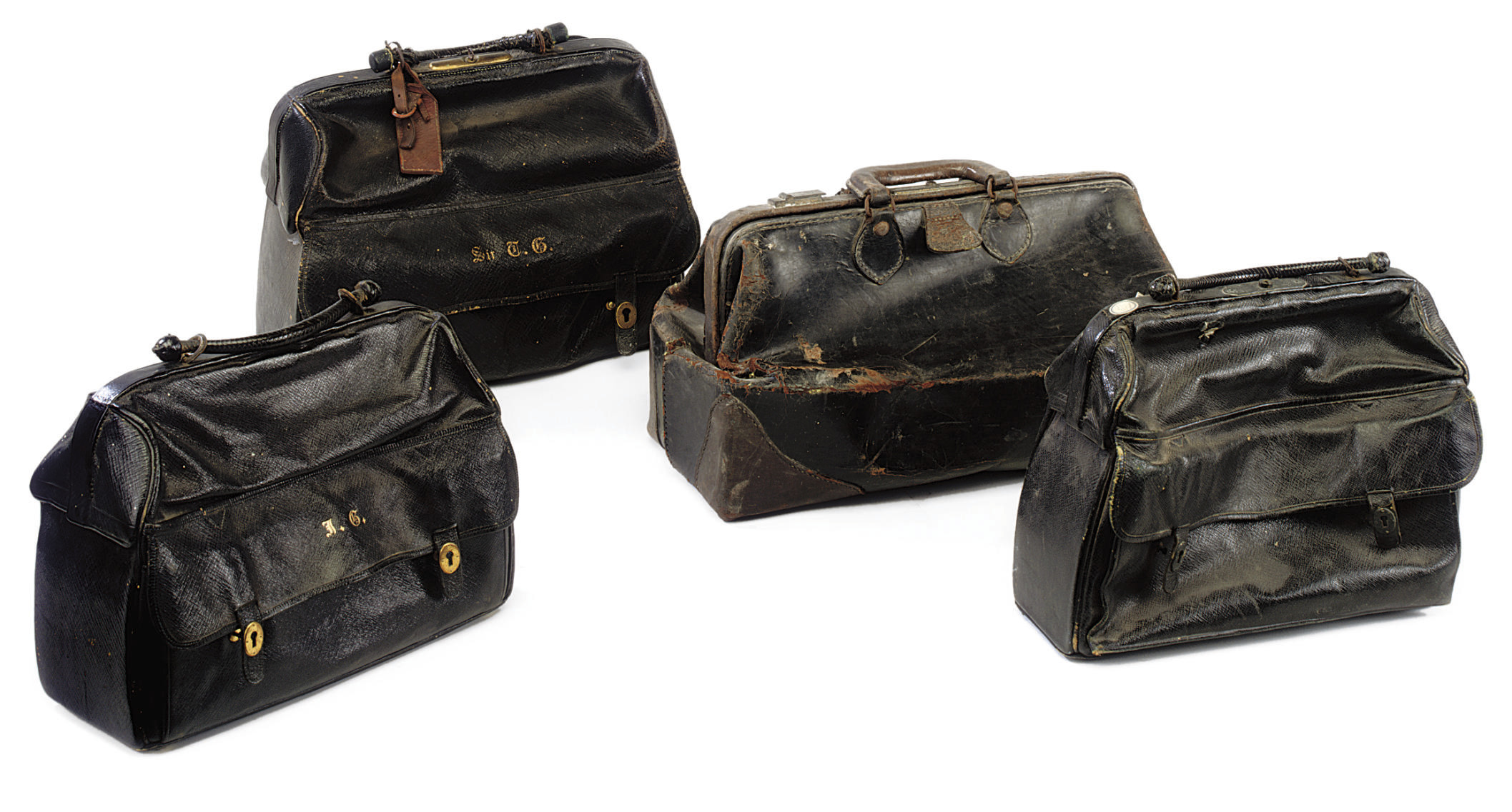 A GROUP OF LATE VICTORIAN LEATHER GLADSTONE BAGS , LATE 19TH CENTURY ...