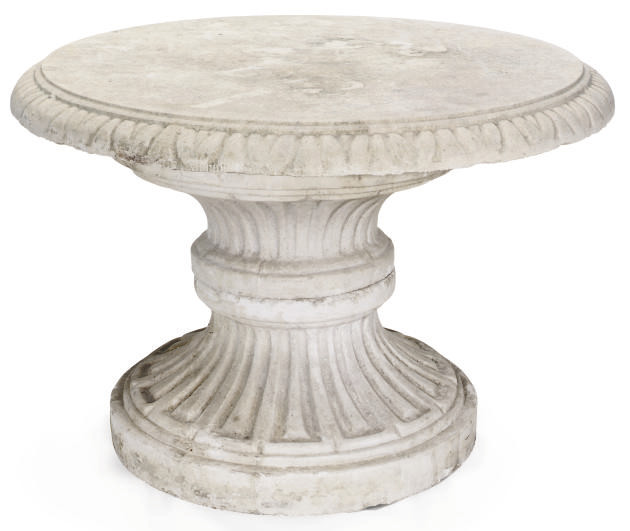 A COMPOSITE STONE GARDEN TABLE