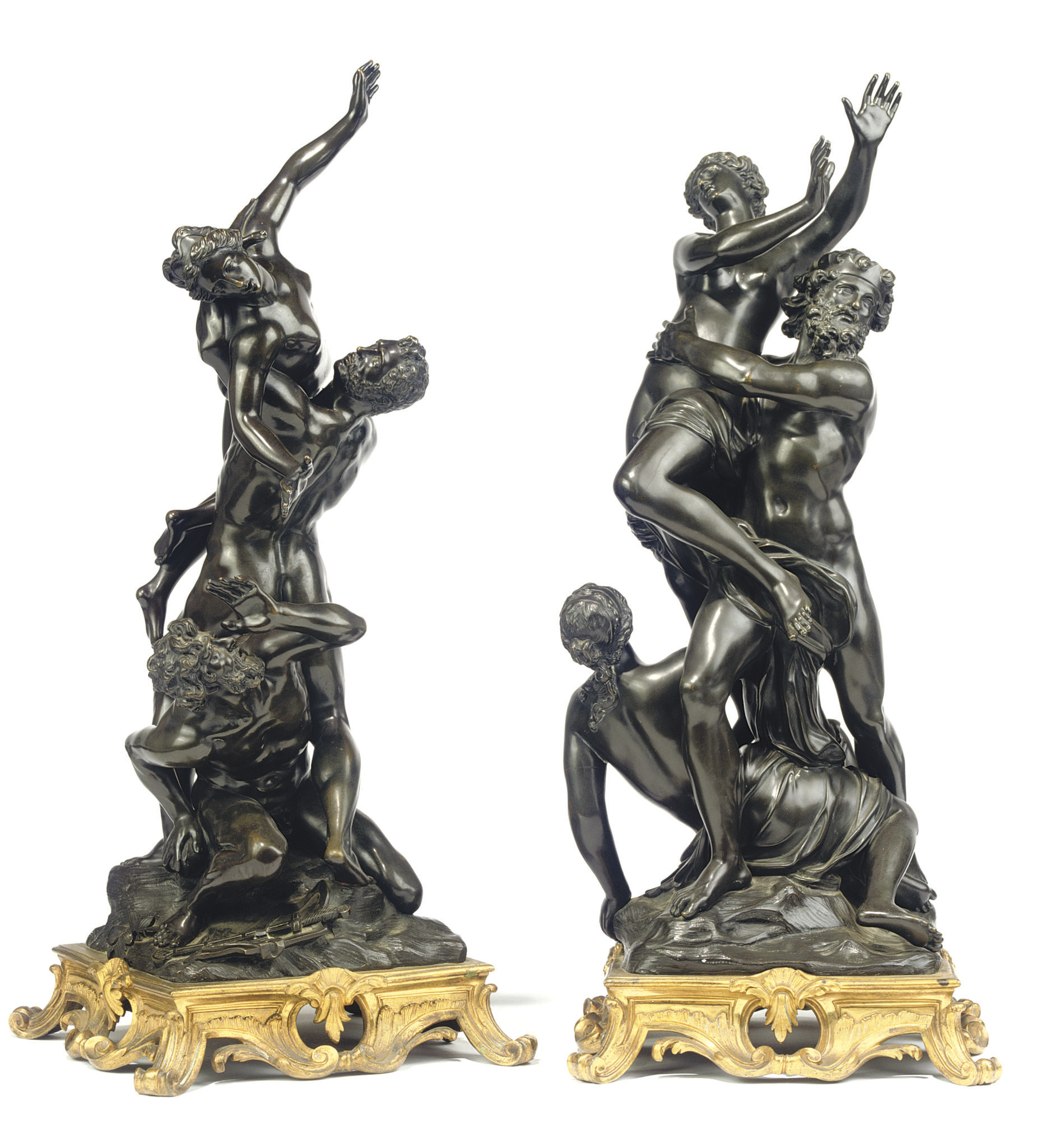 A PAIR OF FRENCH BRONZE GROUPS OF THE RAPE OF A SABINE WOMAN AND THE ...