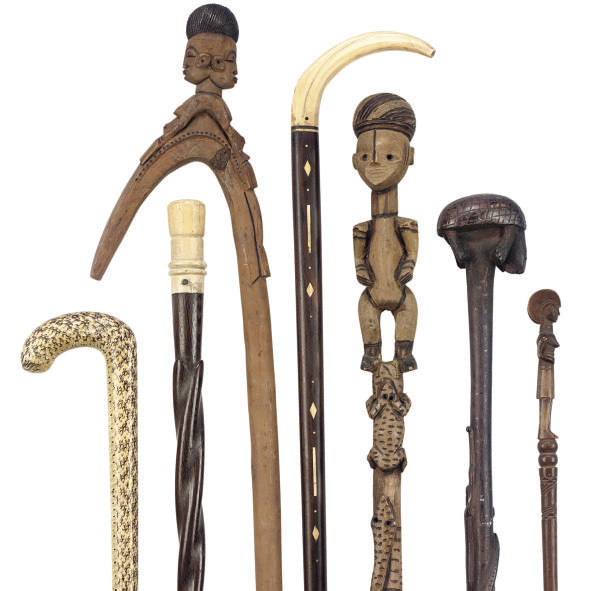 A COLLECTION OF AFRICAN WOOD WALKING STICKS AND STAFFS
