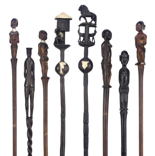 A COLLECTION OF KENYAN AND AFRICAN WOOD STAFFS AND WALKING STICKS ...