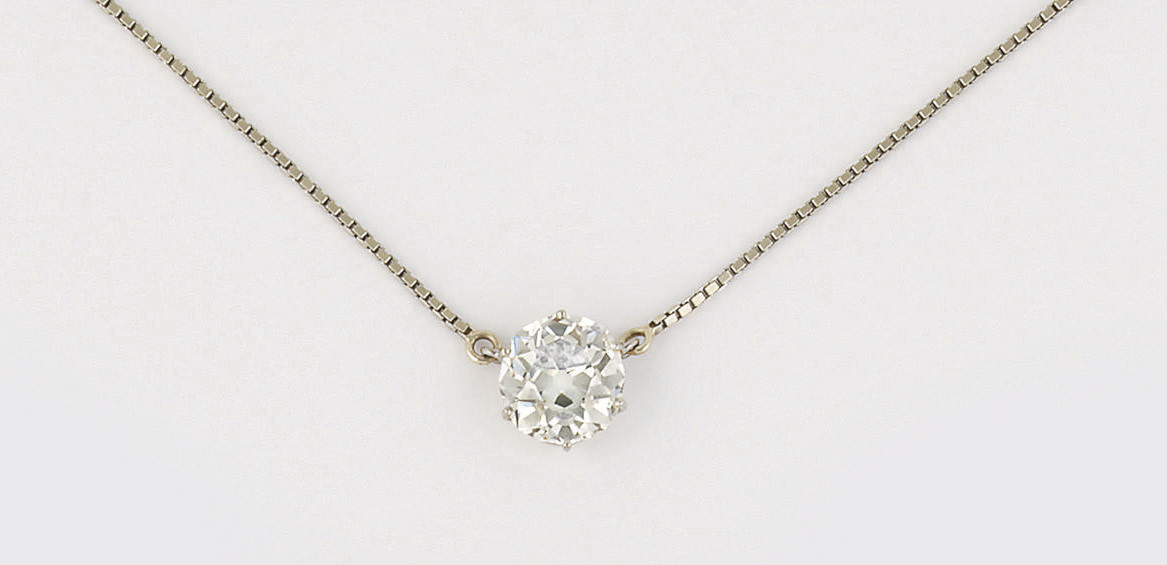 A diamond single stone pendant necklace