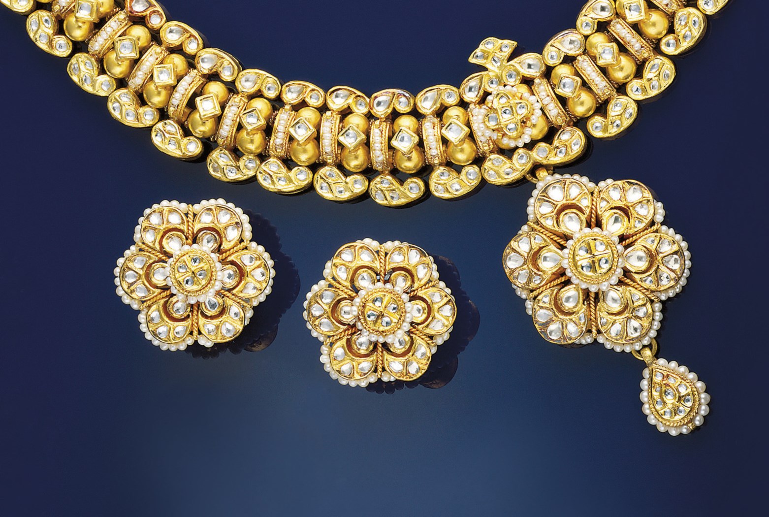An Indian gem necklace and earrings | Christie's