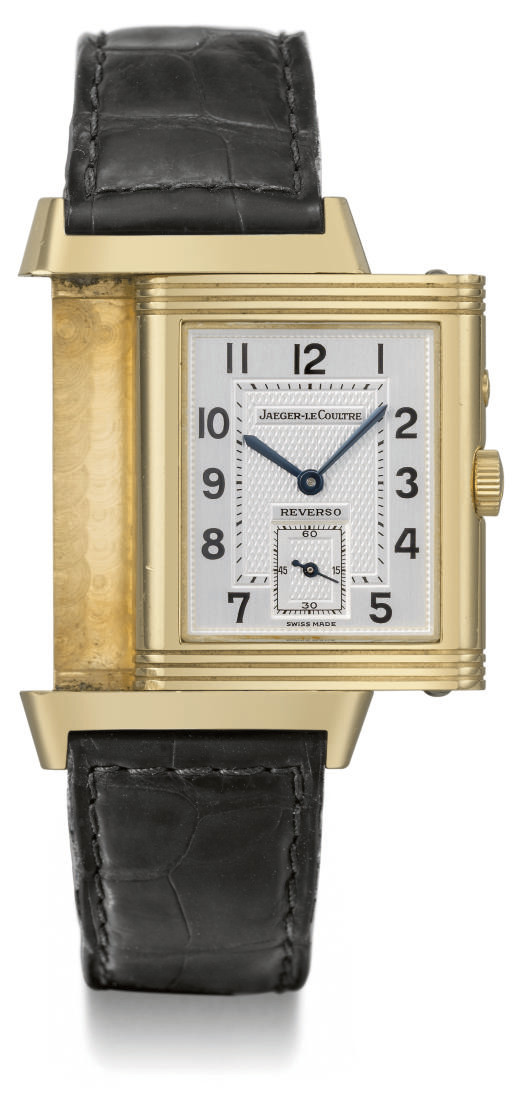 Jaeger-LeCoultre. A fine and large 18K gold double dial dual time ...
