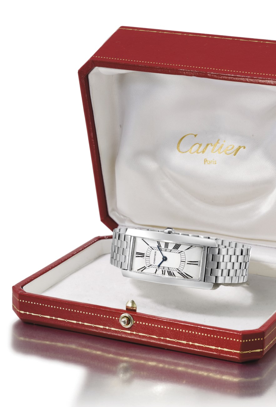 Cartier. A fine and large 18K white gold rectangular curved wristwatch ...