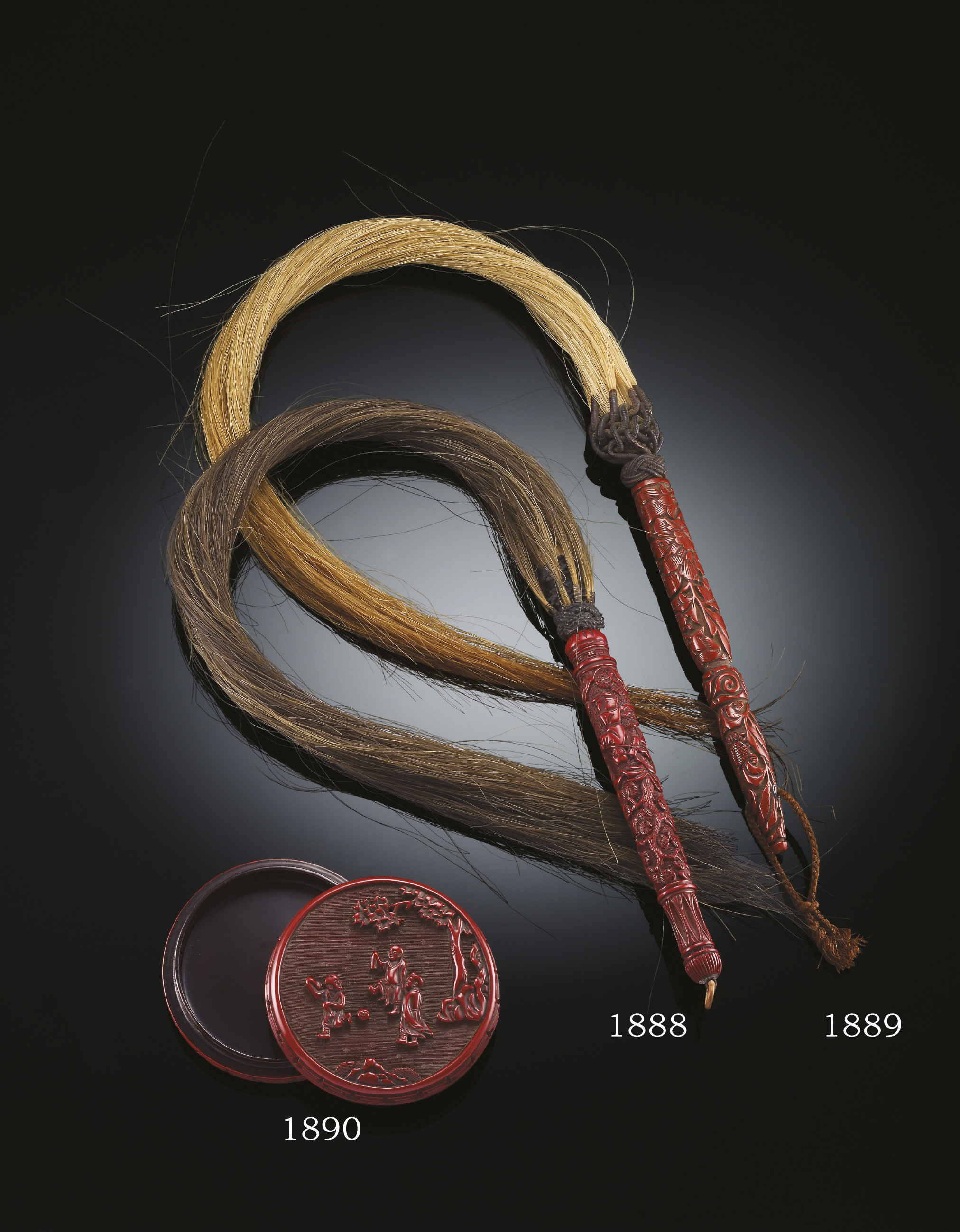 AN UNUSUAL CINNABAR LACQUER FLY-WHISK