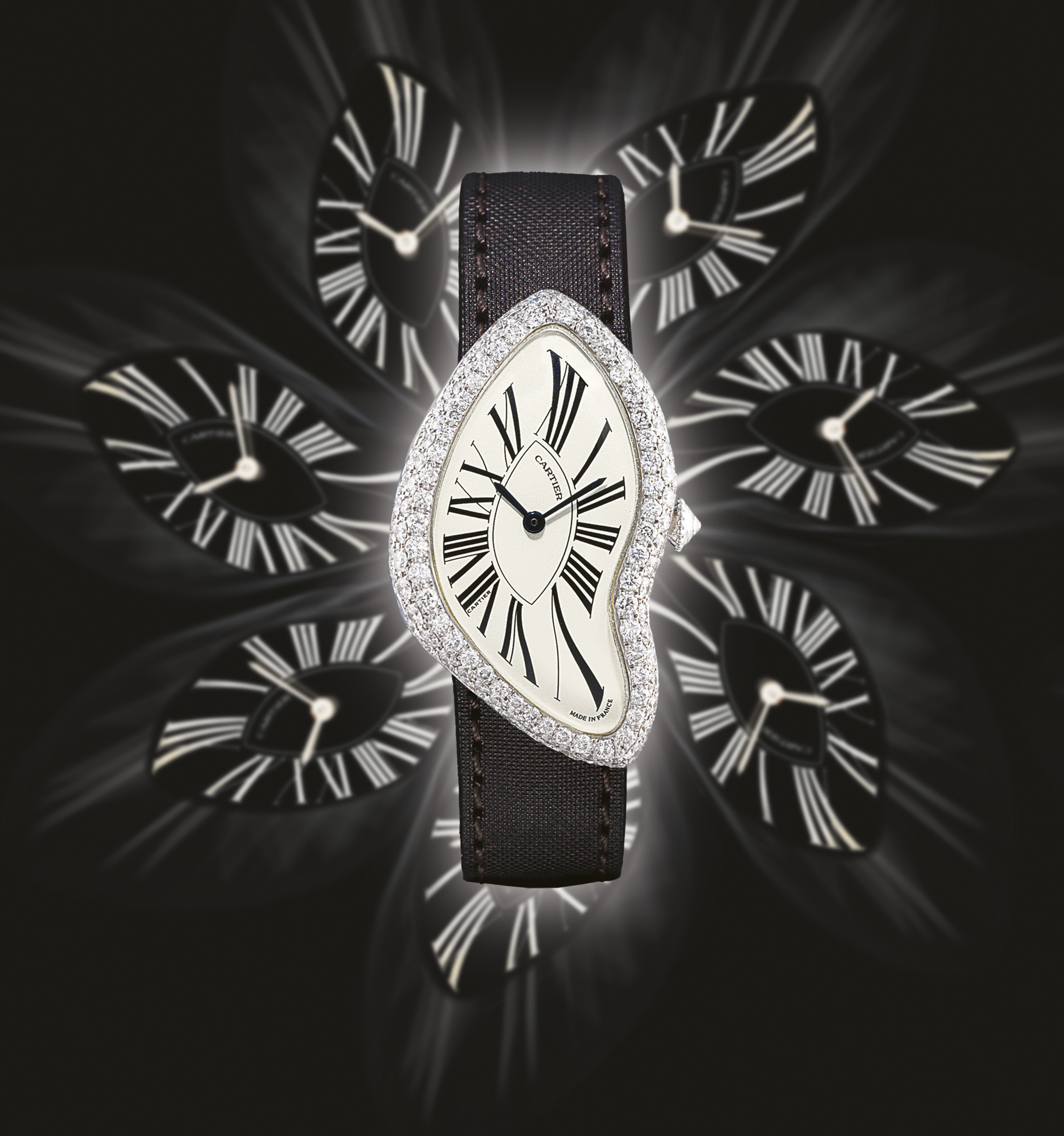 CARTIER, "CRASH" WHITE GOLD AND DIAMOND-SET MANUAL-WINDING LADY'S ...