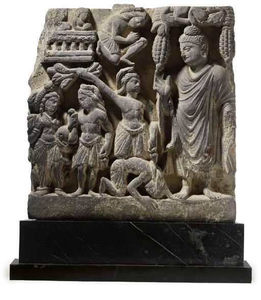 A gray schist relief of the Dipankara Jataka , GANDHARA, 2ND/3RD ...