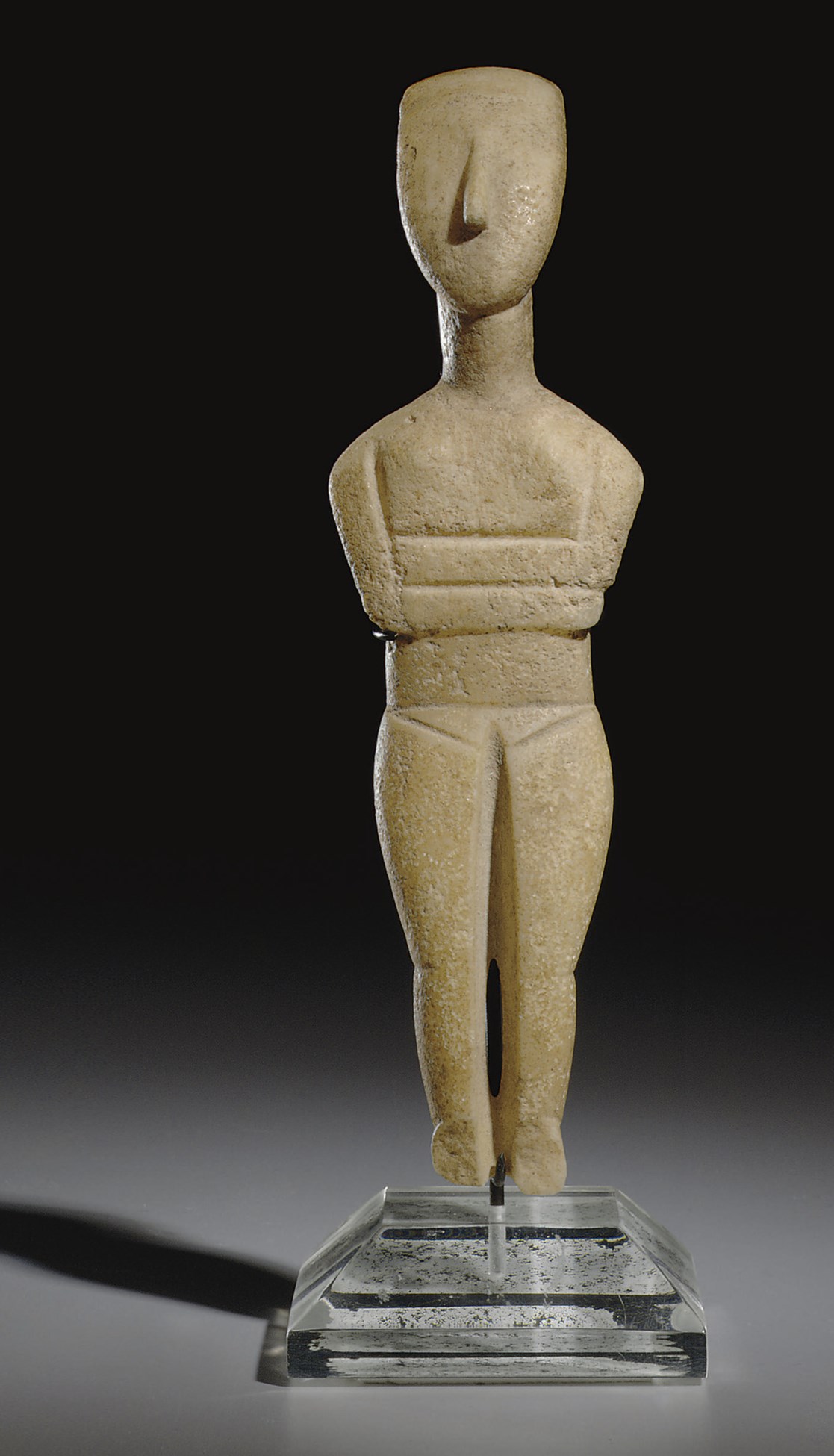 A CYCLADIC MARBLE RECLINING FEMALE FIGURE , EARLY SPEDOS VARIETY, CIRCA ...