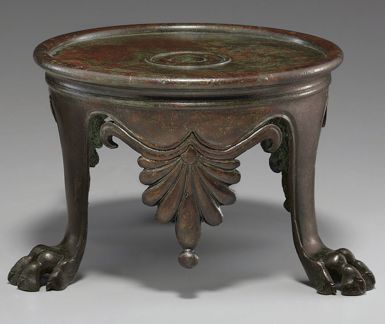 A ROMAN BRONZE TRIPOD STAND