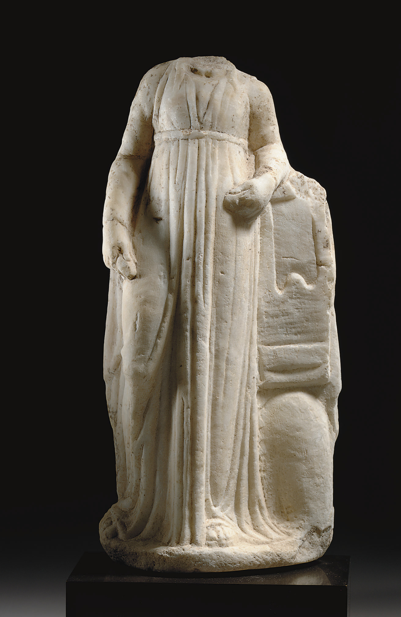 A ROMAN MARBLE FIGURE OF APOLLO KITHAROIDOS , CIRCA 1ST CENTURY A.D ...