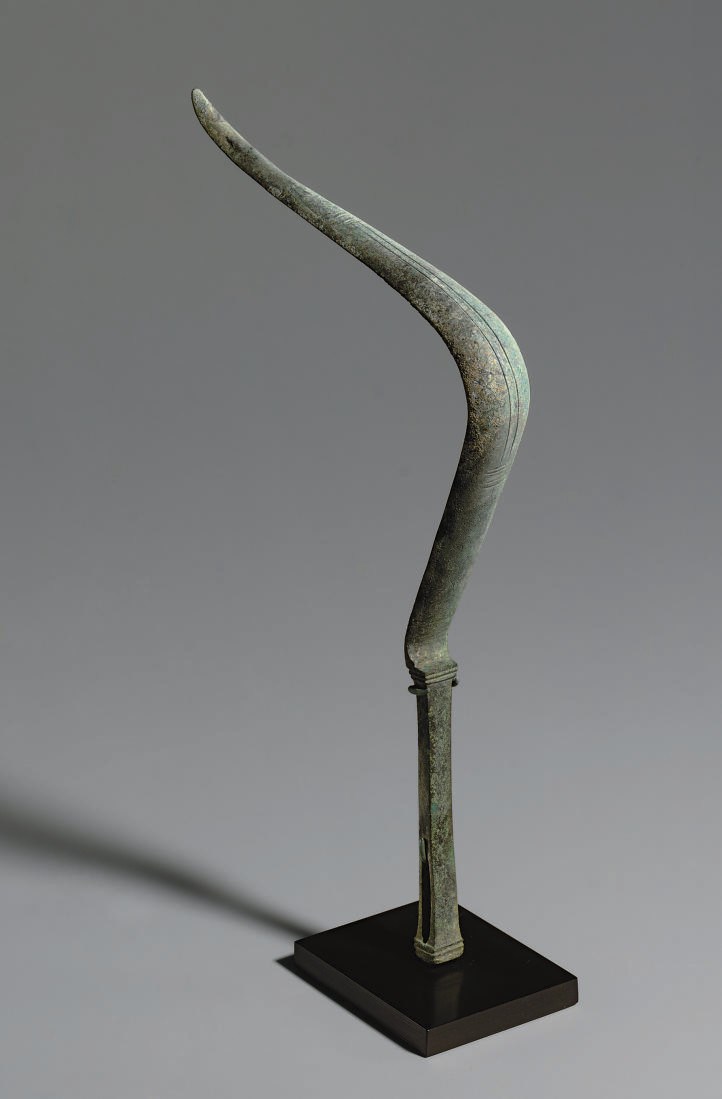 A ROMAN BRONZE STRIGIL