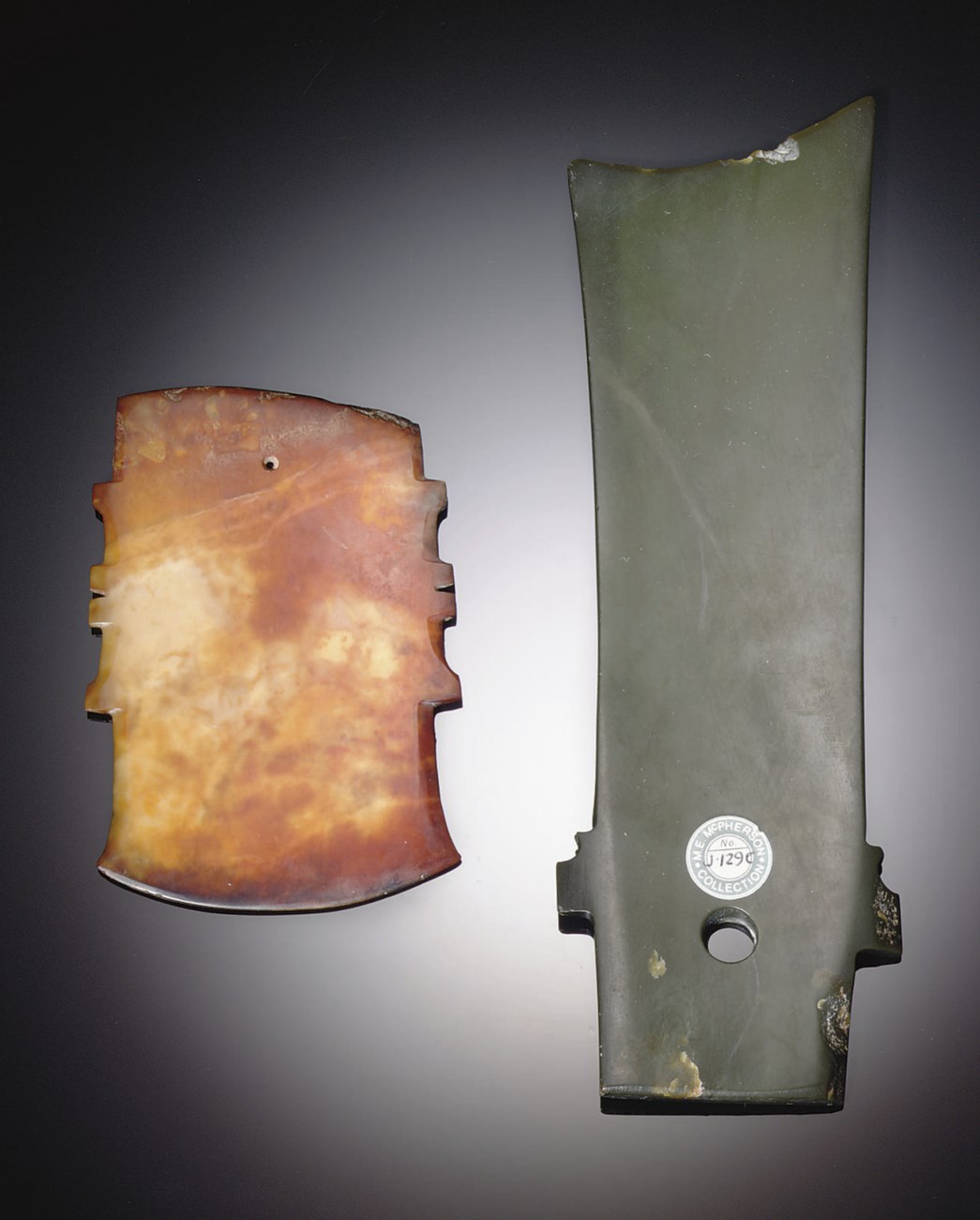 A DARK GREEN JADE SCEPTER AND A RUSSET AND BEIGE JADE AXE , NEOLITHIC ...