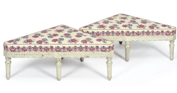 A PAIR OF PAINTED AND UPHOLSTERED TRIANGULAR BENCHES,
