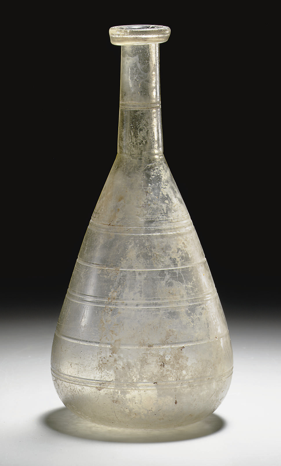 A ROMAN GLASS BOTTLE , CIRCA 1ST CENTURY B.C.-1ST CENTURY A.D. | Christie's