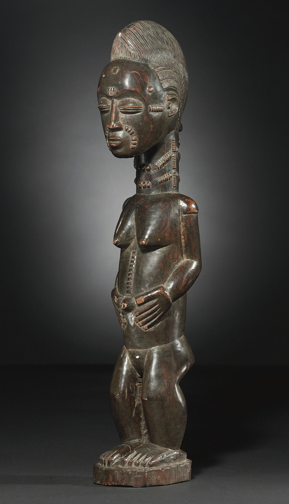 A BAULE FEMALE FIGURE , IVORY COAST | Christie's