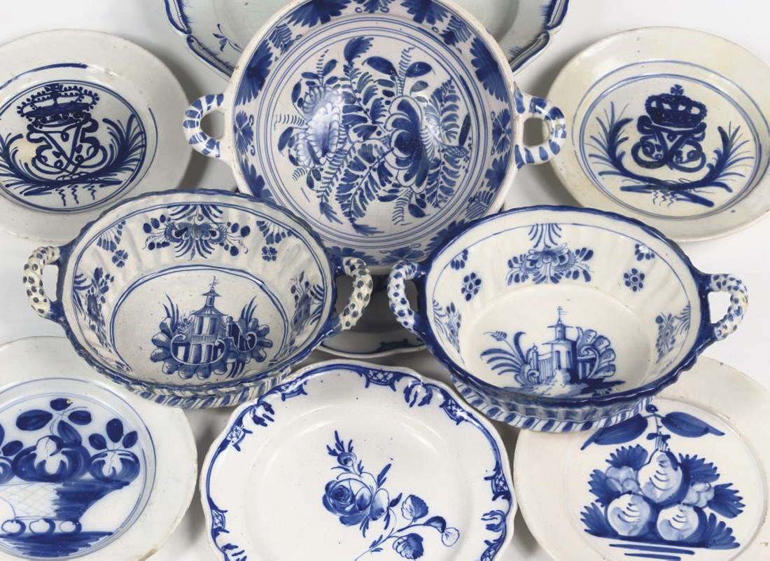 An assorted lot of Danish blue and white faience plates, a bowl and two ...