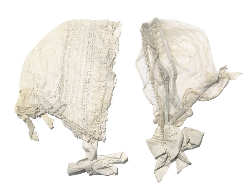 A COLLECTION OF SUN BONNETS AND A QUAKER APRON