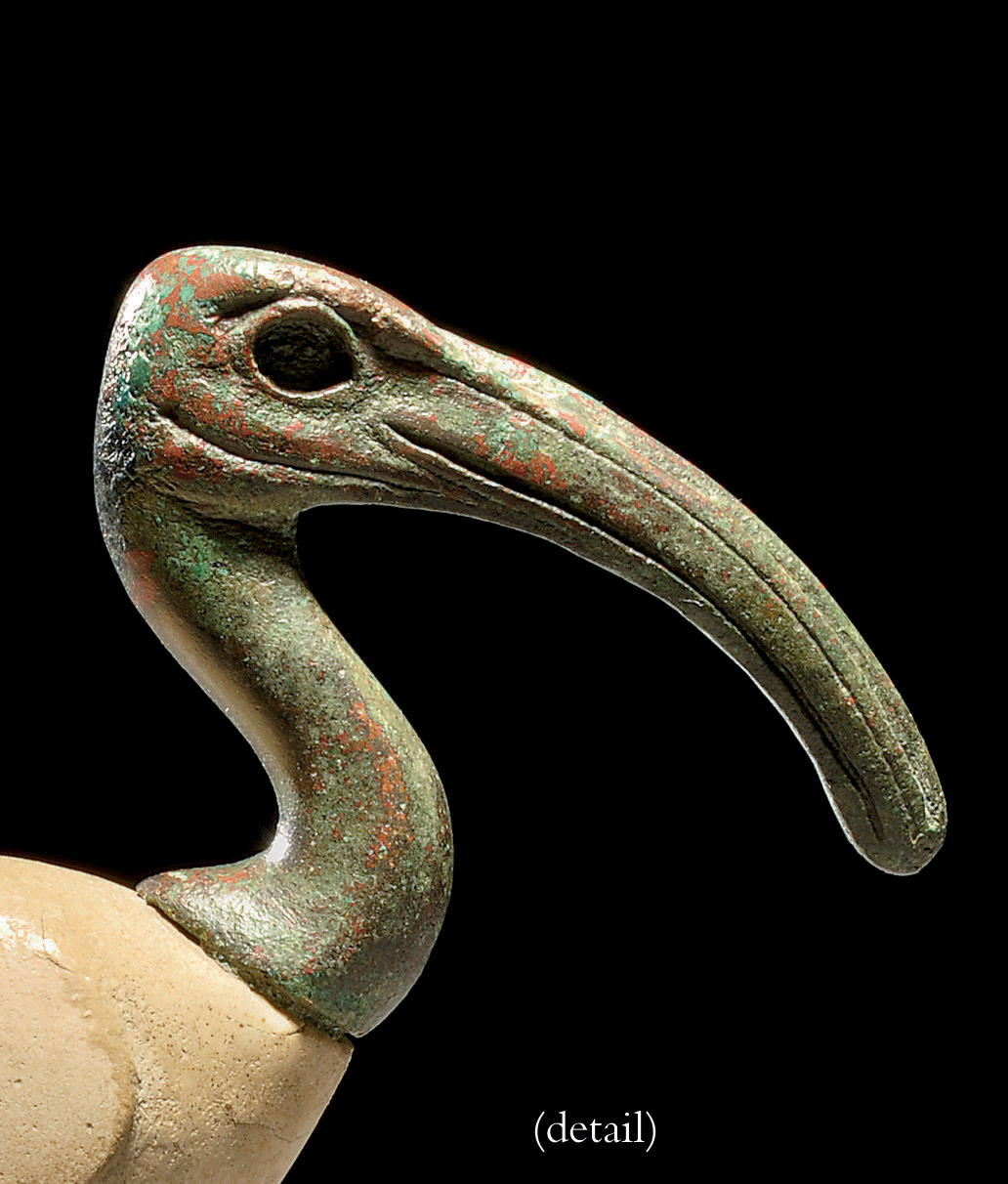 AN EGYPTIAN BRONZE IBIS HEAD
