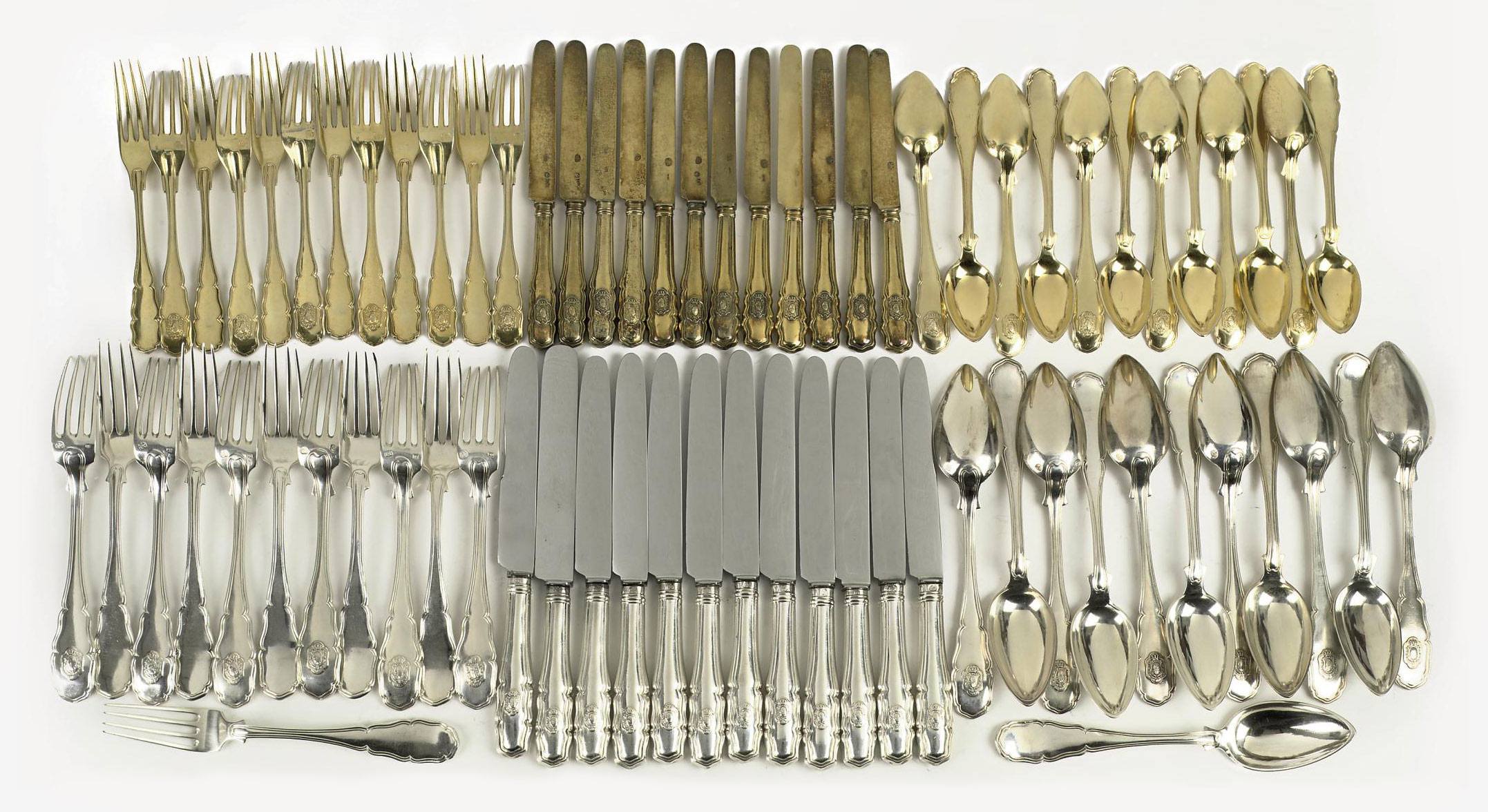 An Austrian Royal silver-gilt and silver part flatware servic