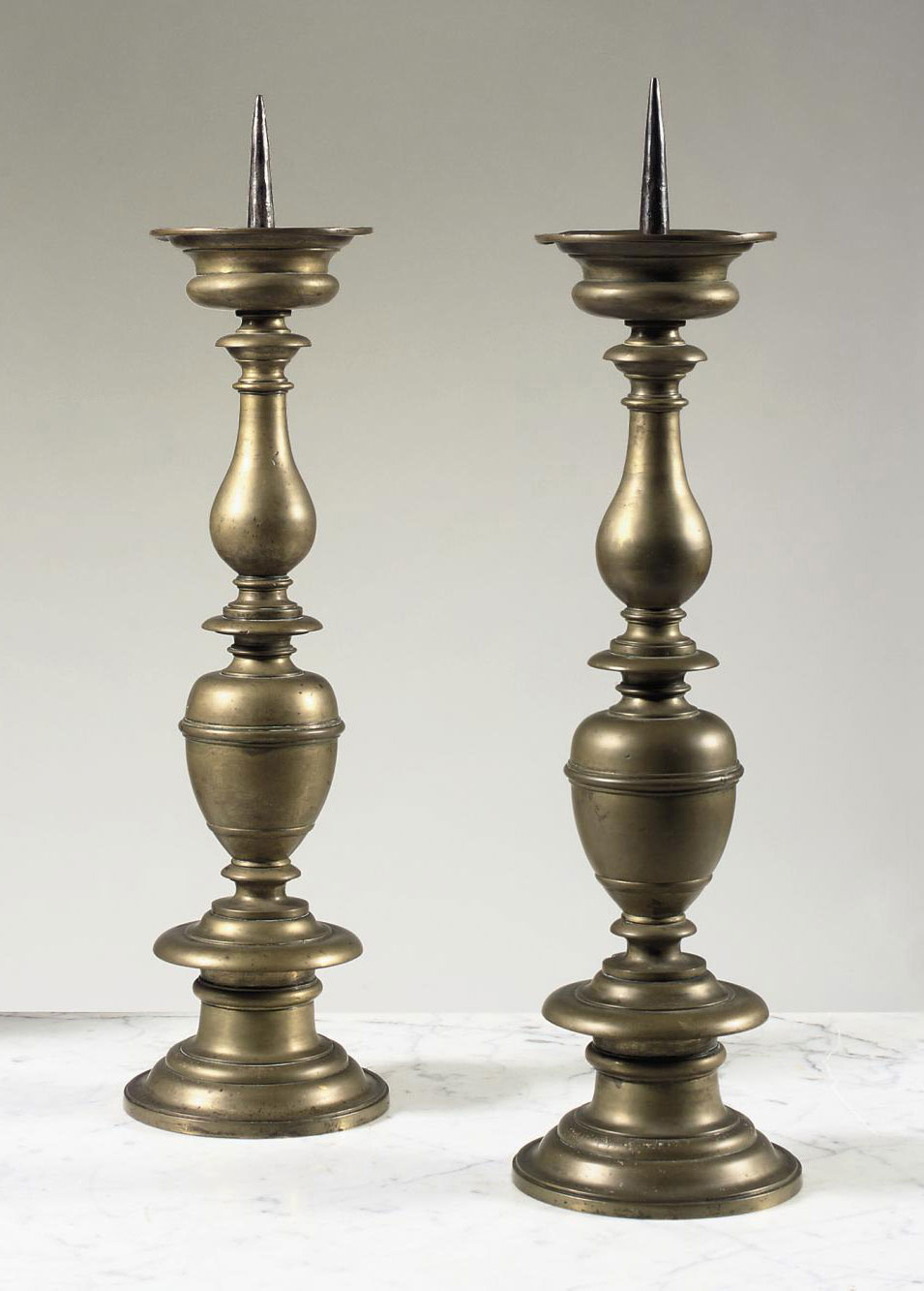 A PAIR OF BRASS PRICKET CANDLESTICKS , 17TH CENTURY, ITALIAN OR FLEMISH ...