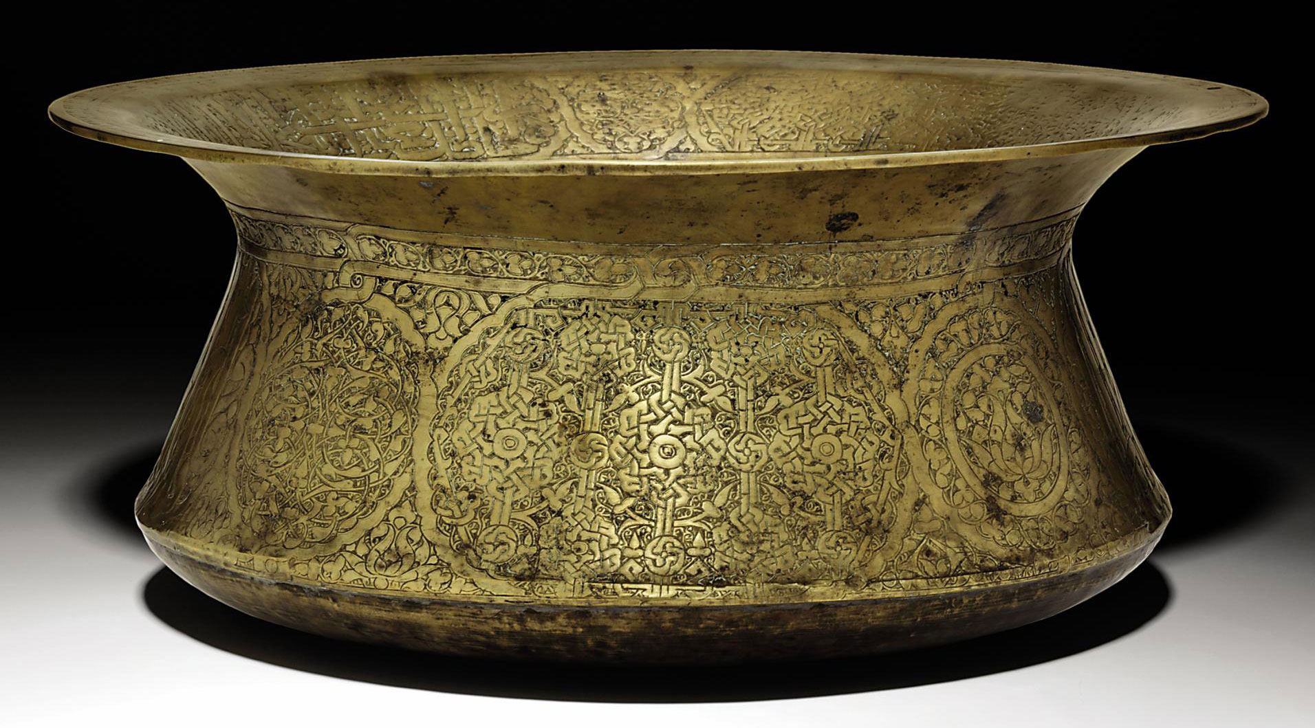 A LARGE MAMLUK SILVER-INLAID BRASS BASIN , EGYPT, AL-NASIR MUHAMMAD ...