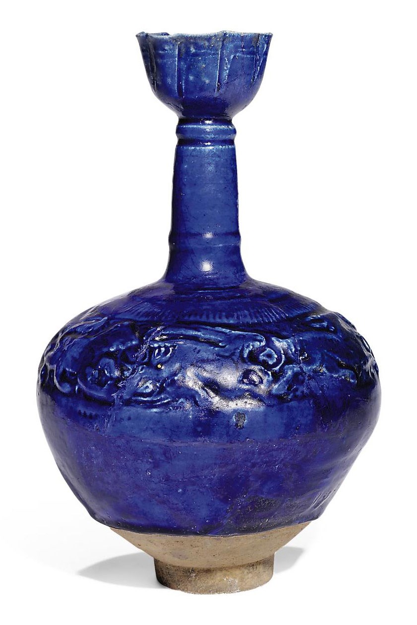 A MOULDED COBALT-BLUE GLAZED POTTERY BOTTLE , PROBABLY KASHAN, IRAN ...