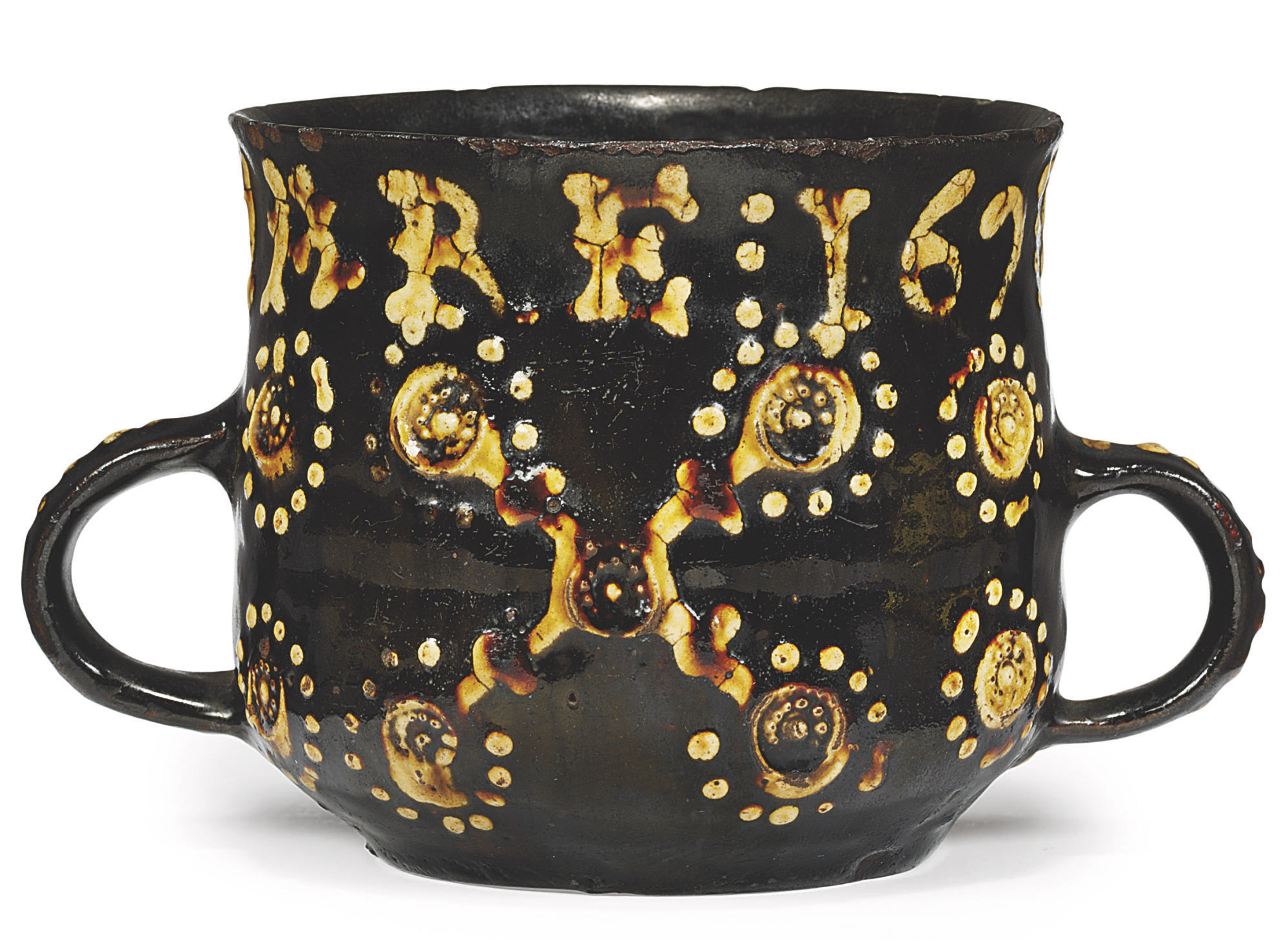 A CHARLES II DECORATED PEARWOOD LOVING CUP , DATED 1665 | Christie's