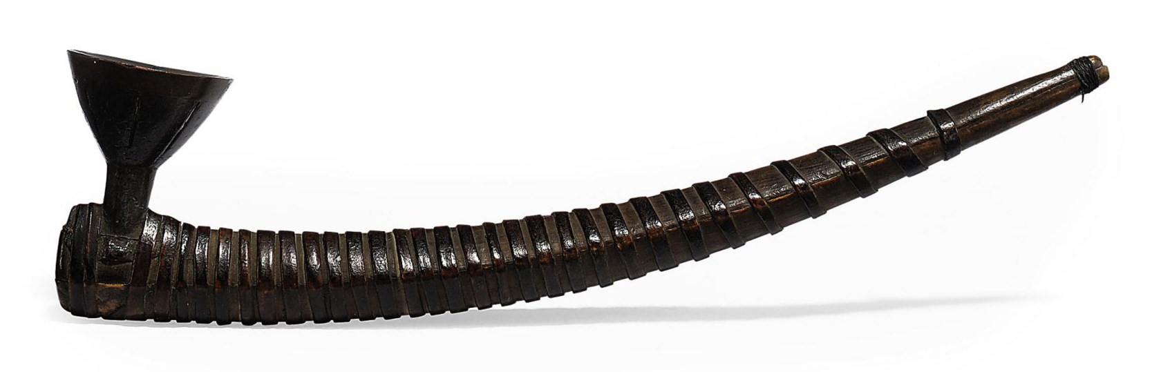 AN INUIT LEATHER-BANDED PIPE , ALASKA | Christie's