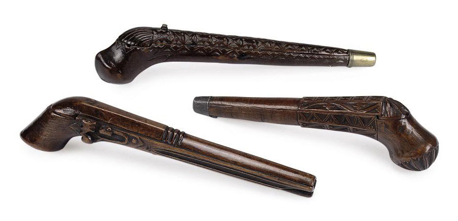 TWO LARGE AUSTRIAN MEERSCHAUM PIPES CARVED AS THE HEADS OF NUBIAN WOMEN ...