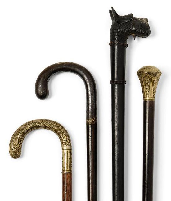 THREE INDIAN ROSEWOOD WALKING CANES WITH DAMASCENED INLAID HANDLES ...