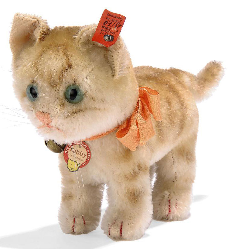 A STEIFF STANDING TABBY, (1317,0), ginger mohair, green and black glass ...