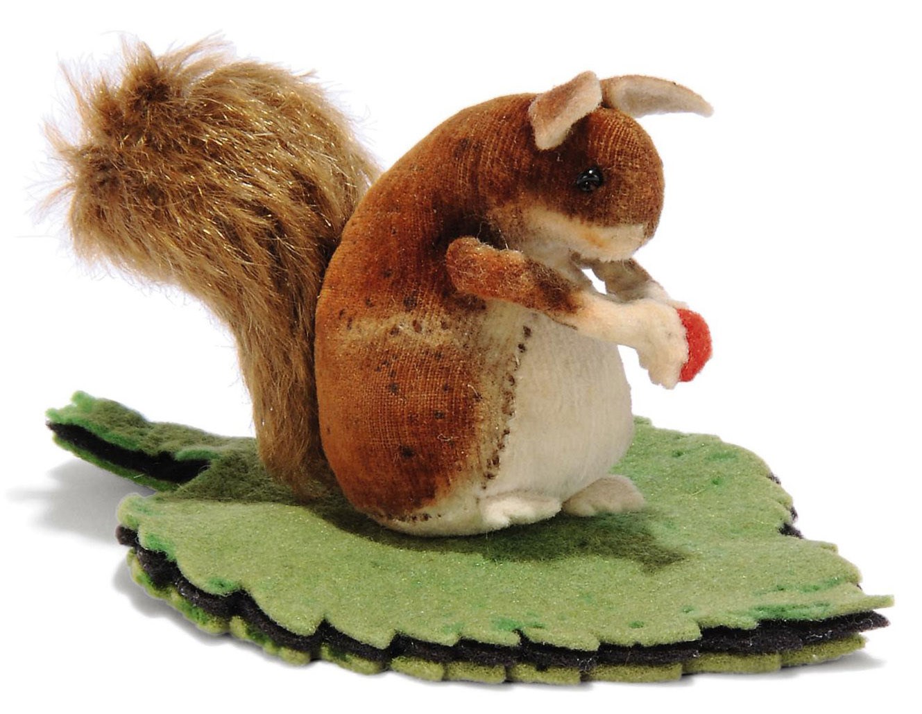 A STEIFF VELVET SQUIRREL PINCUSHION, (3419), brown and white, black ...