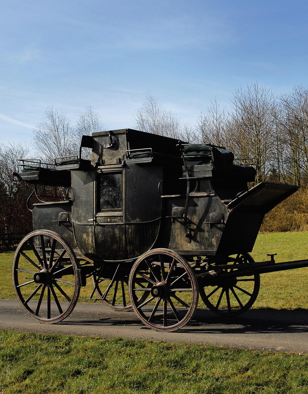 AN EARLY VICTORIAN DARK GREEN JAPANNED PRIVATE COACH , BY HOLLAND AND ...