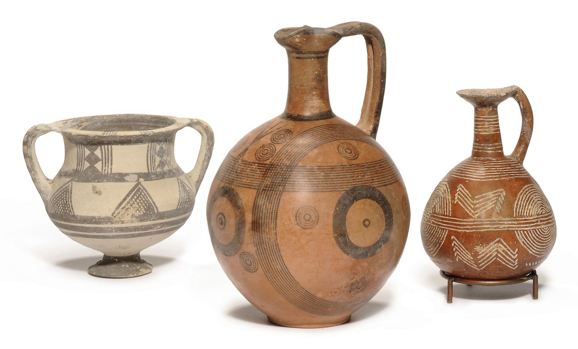 A CYPRIOT BLACK-ON-RED WARE JUG , CYPRO-ARCHAIC, CIRCA 750-600 B.C ...