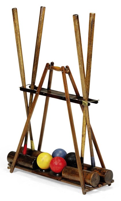 A MAHOGANY CROQUET STAND AND SET