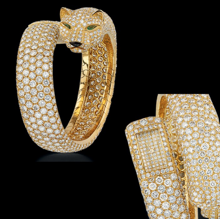A LADY'S PANTHER BANGLE WATCH, BY CARTIER