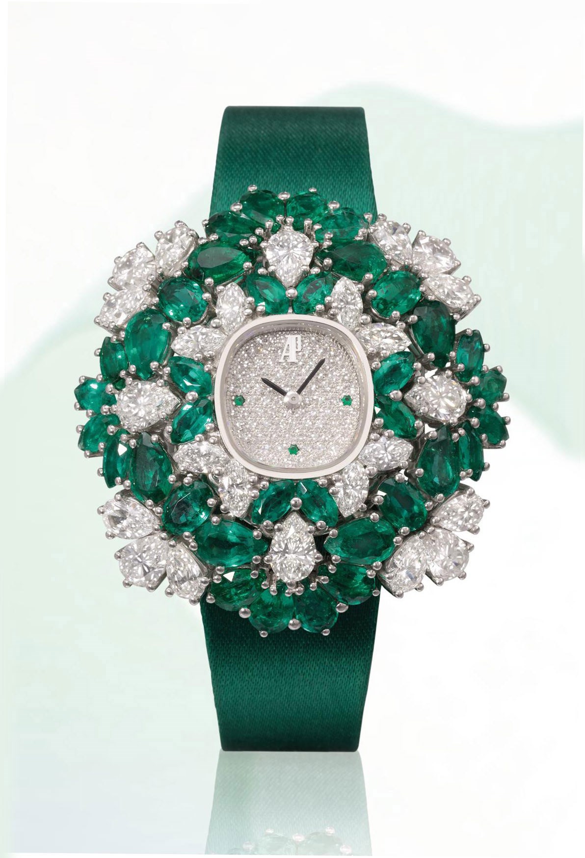 AUDEMARS PIGUET, NO. 1LADY'S WHITE GOLD, DIAMOND AND EMERALD-SET QUARTZ ...