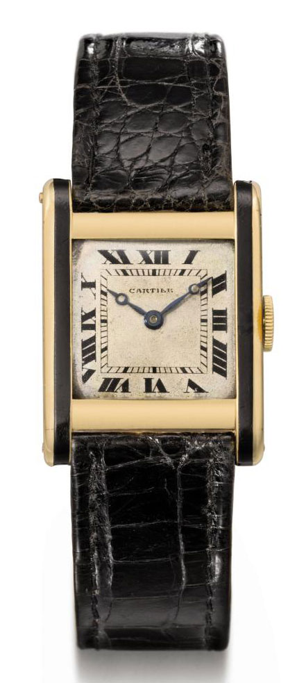 Cartier. A fine and unusual 18K gold rectangular wristwatch with inlaid ...