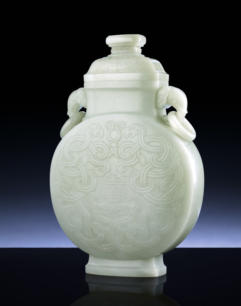 A SUPERBLY CARVED WHITE JADE MOONFLASK AND COVER | Christie's