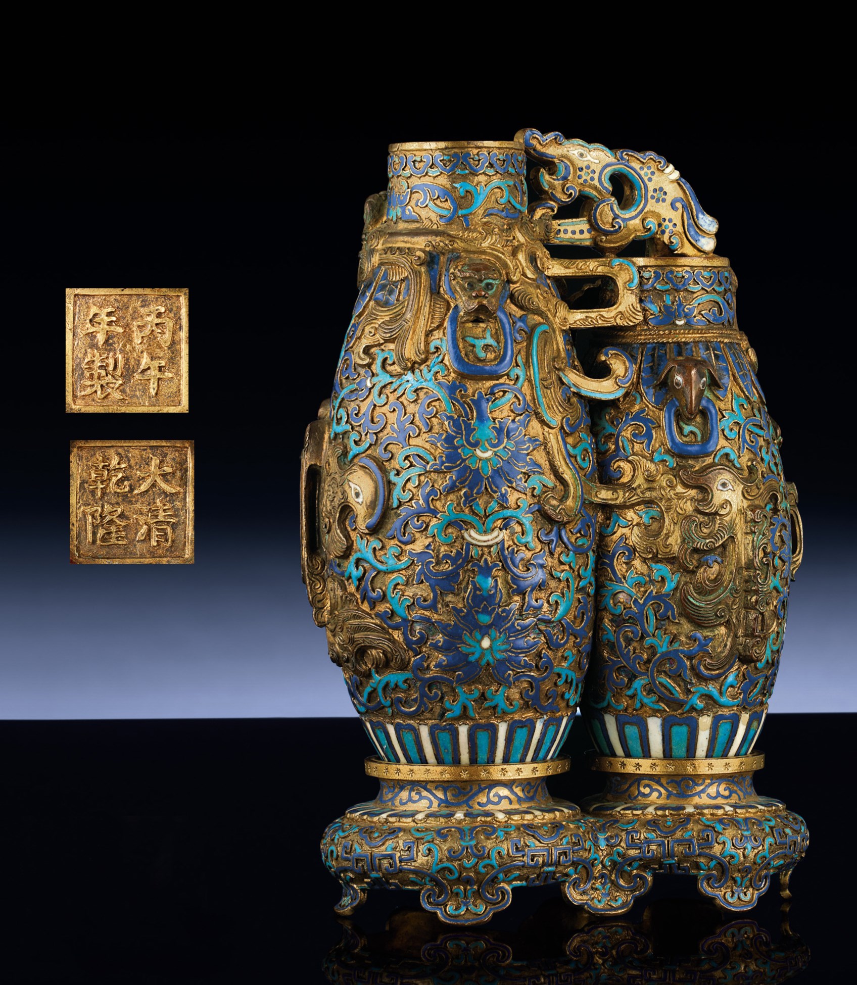 A CHAMPLEVE AND GILT-BRONZE ENAMELLED DOUBLE-VASE AND STAND