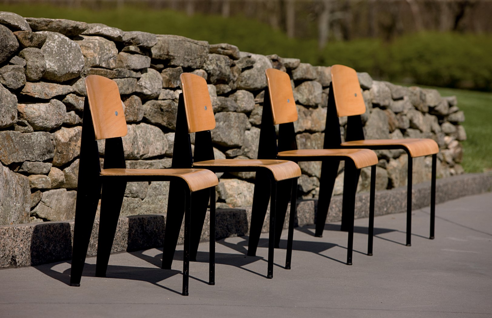 JEAN PROUVE (1901-1984) , A SET OF FOUR LACQUERED STEEL AND PLYWOOD ...