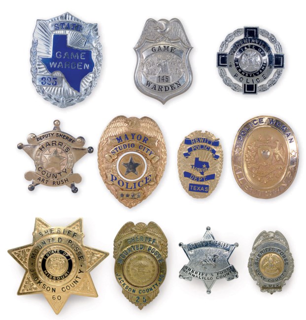 A GROUP OF FIFTEEN LAW ENFORCEMENT BADGES | Christie's